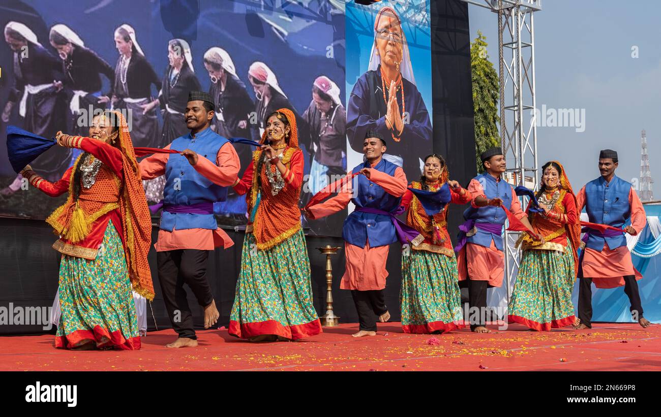 Tribal men and women wearing traditional attire dancing at the Johar ...