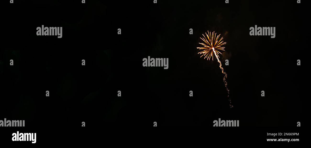 one small fireworks in the night sky Stock Photo - Alamy