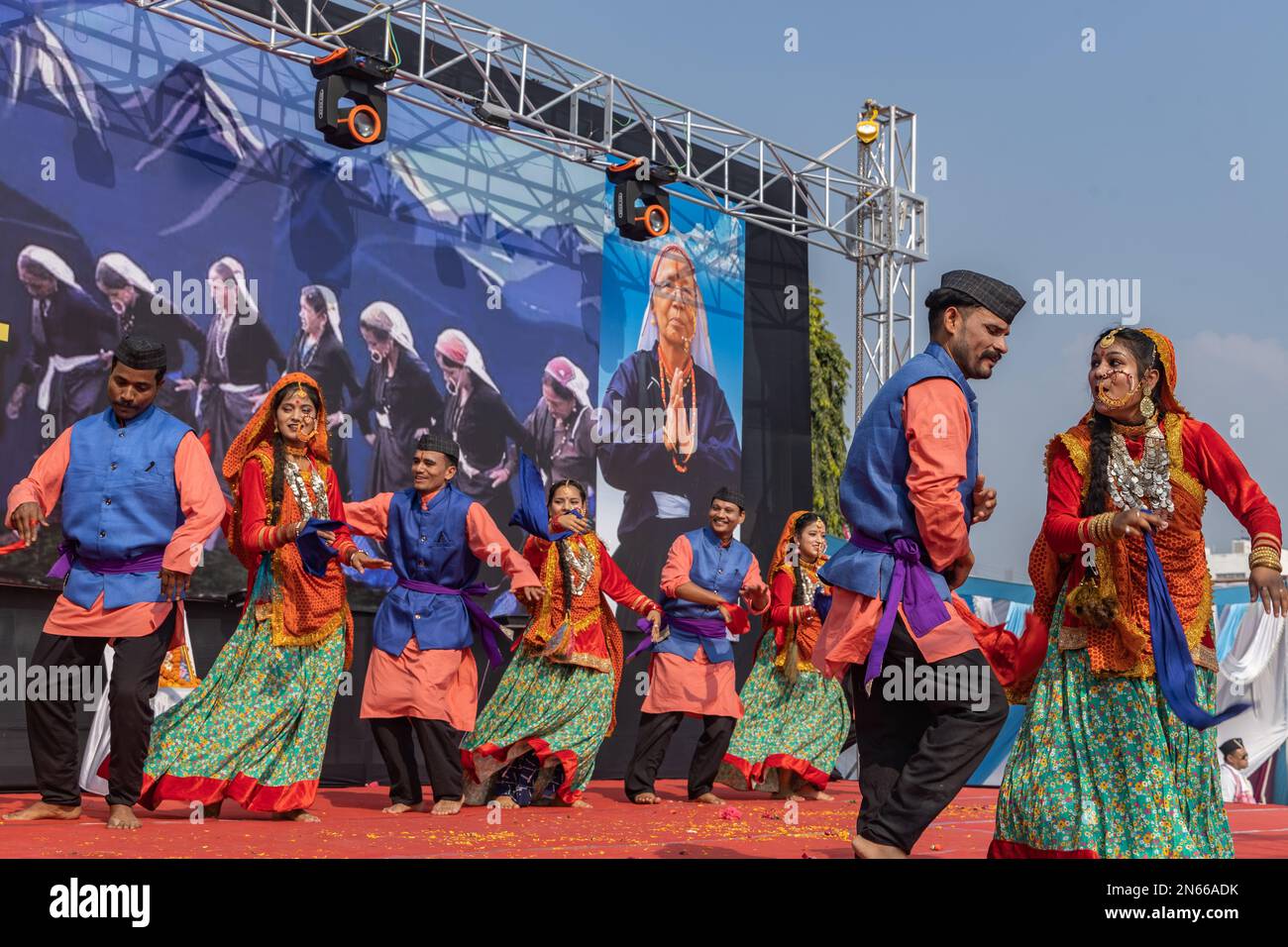 Tribal men and women wearing traditional attire dancing at the Johar ...