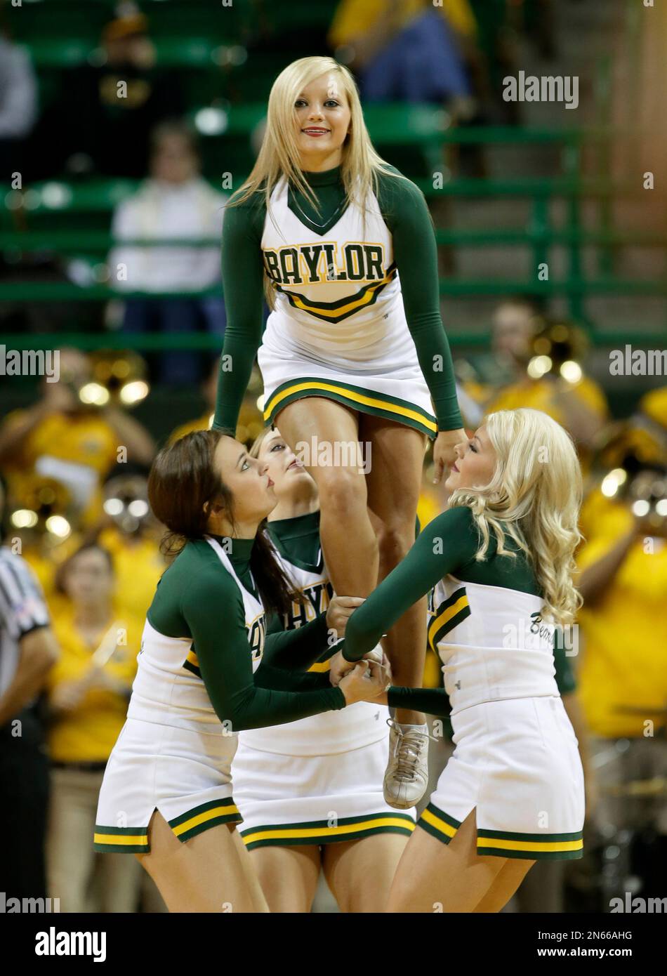 Members of the Baylor cheerleaders perform during an NCAA college ...
