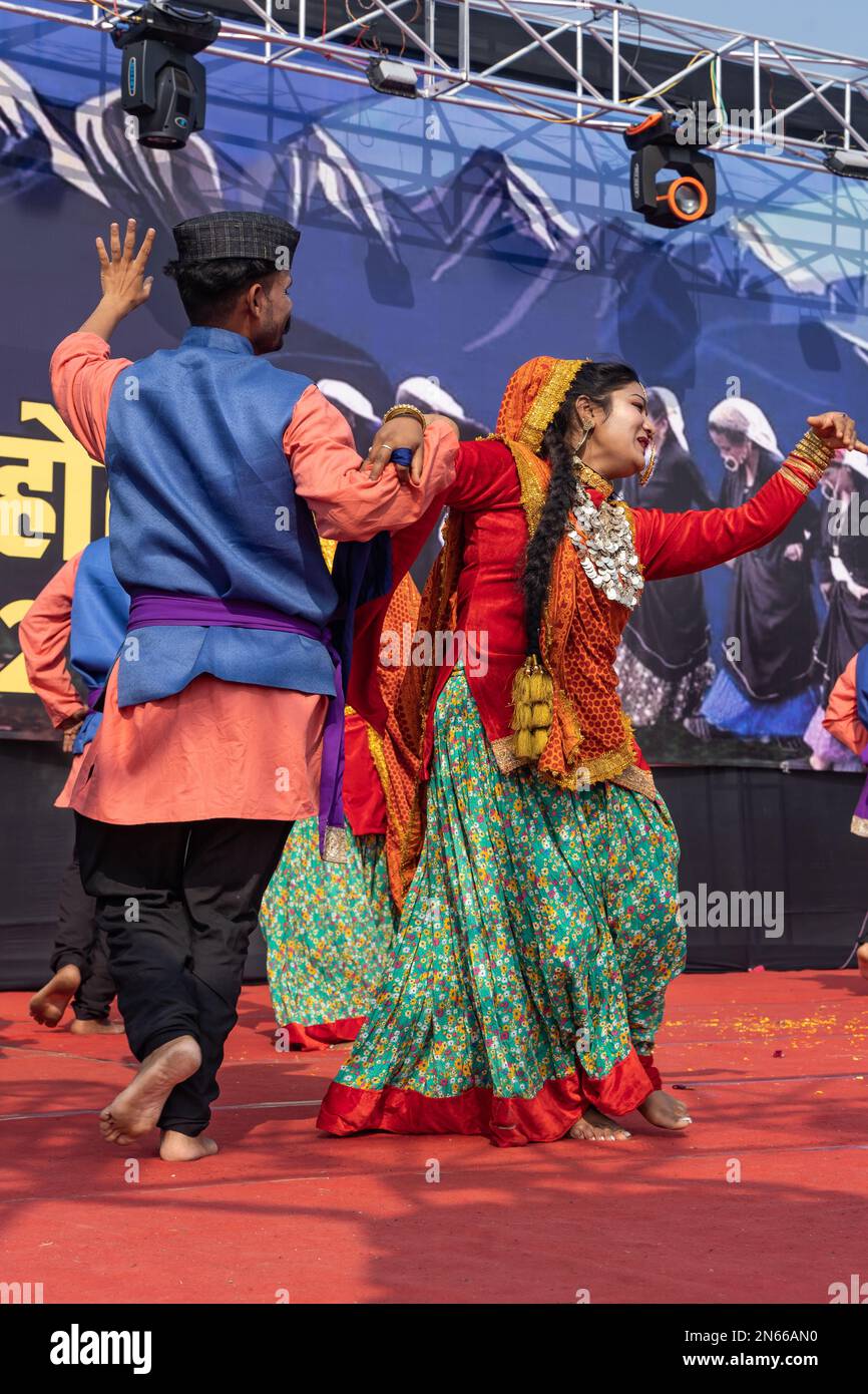 Tribal men and women wearing traditional attire dancing at the Johar ...