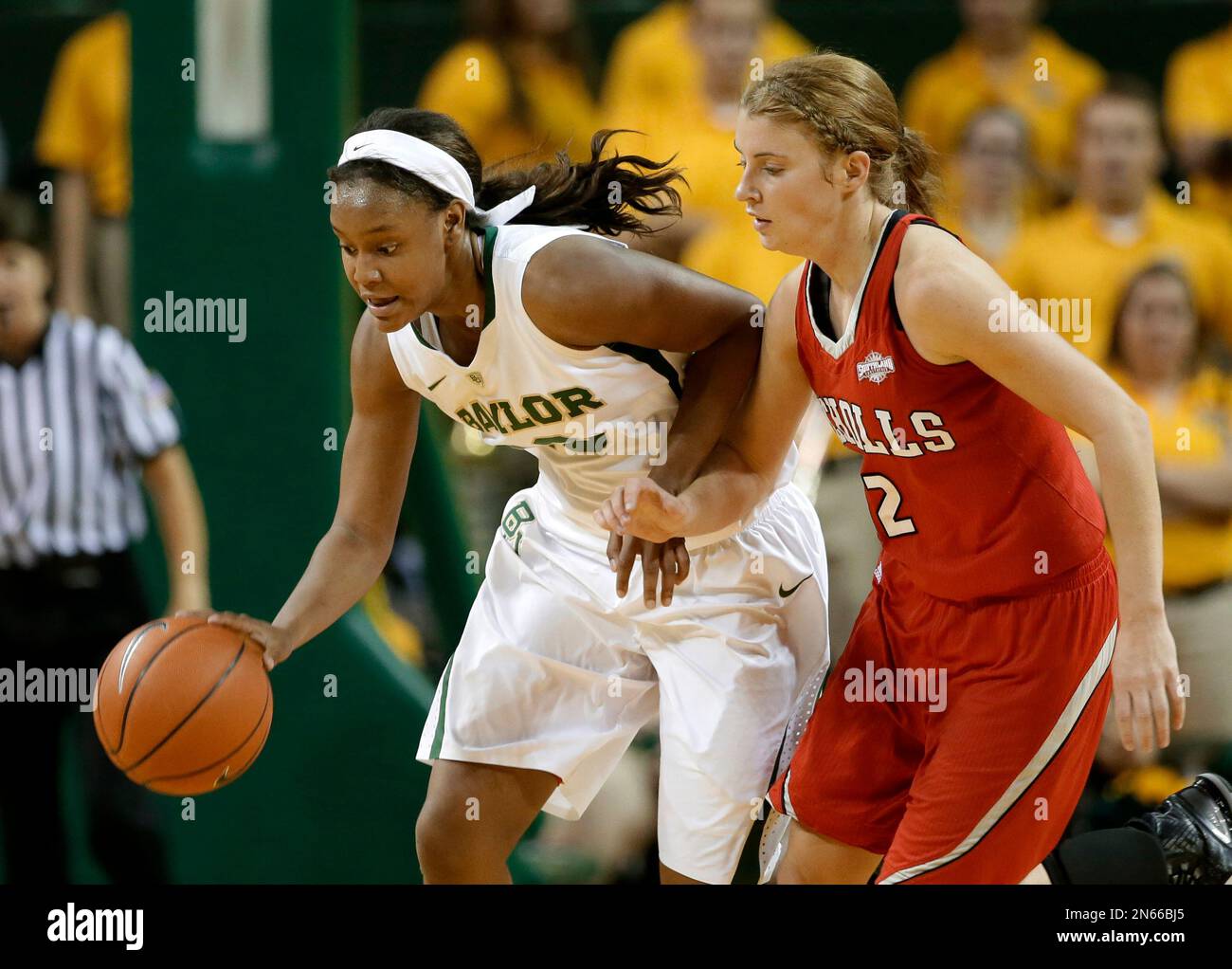 Baylor's Nina Davis, left, handles the ball as Nicholls State's Jenny ...