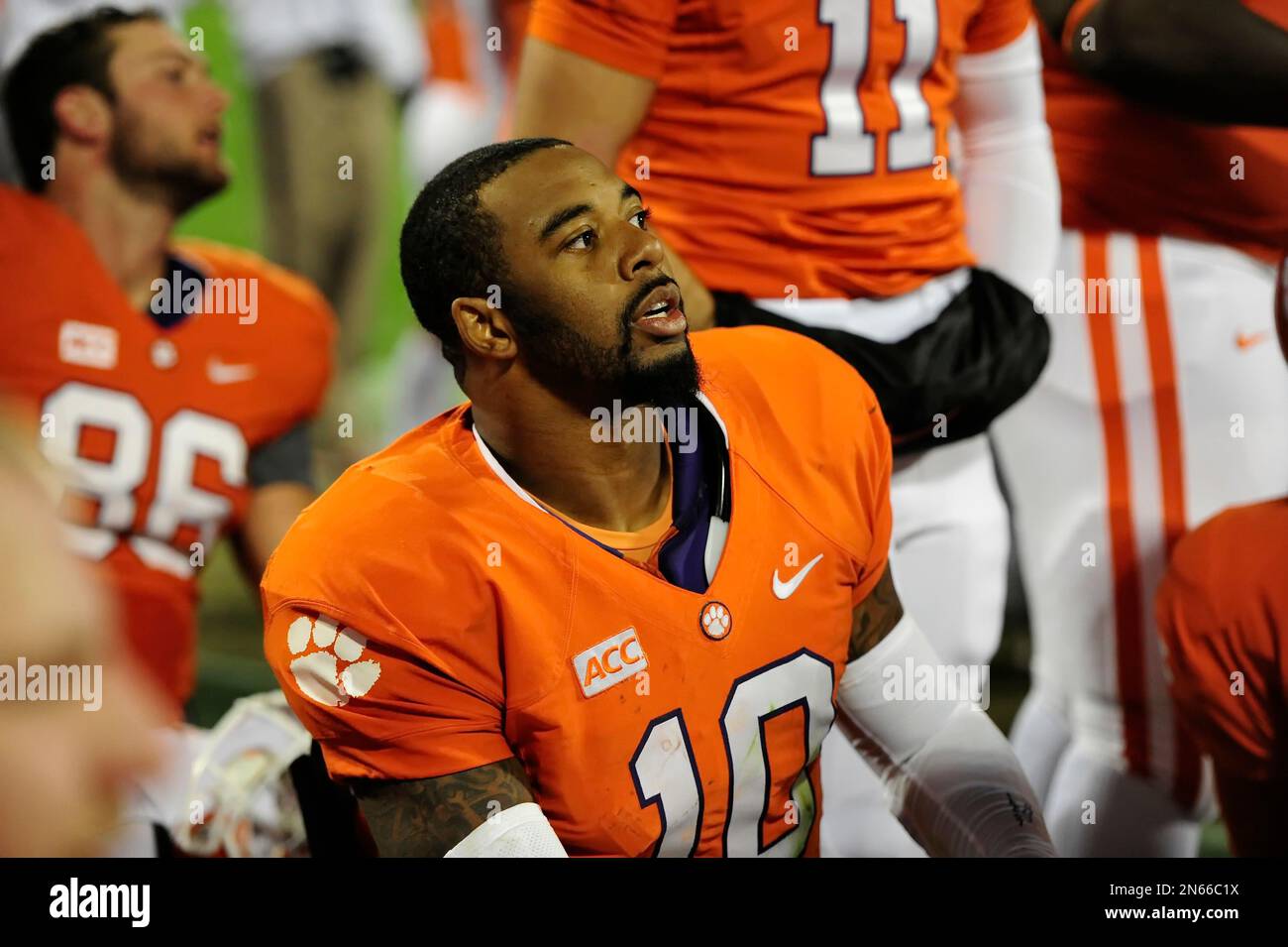 Clemson quarterback Tajh Boyd watches the video screen from the bench ...