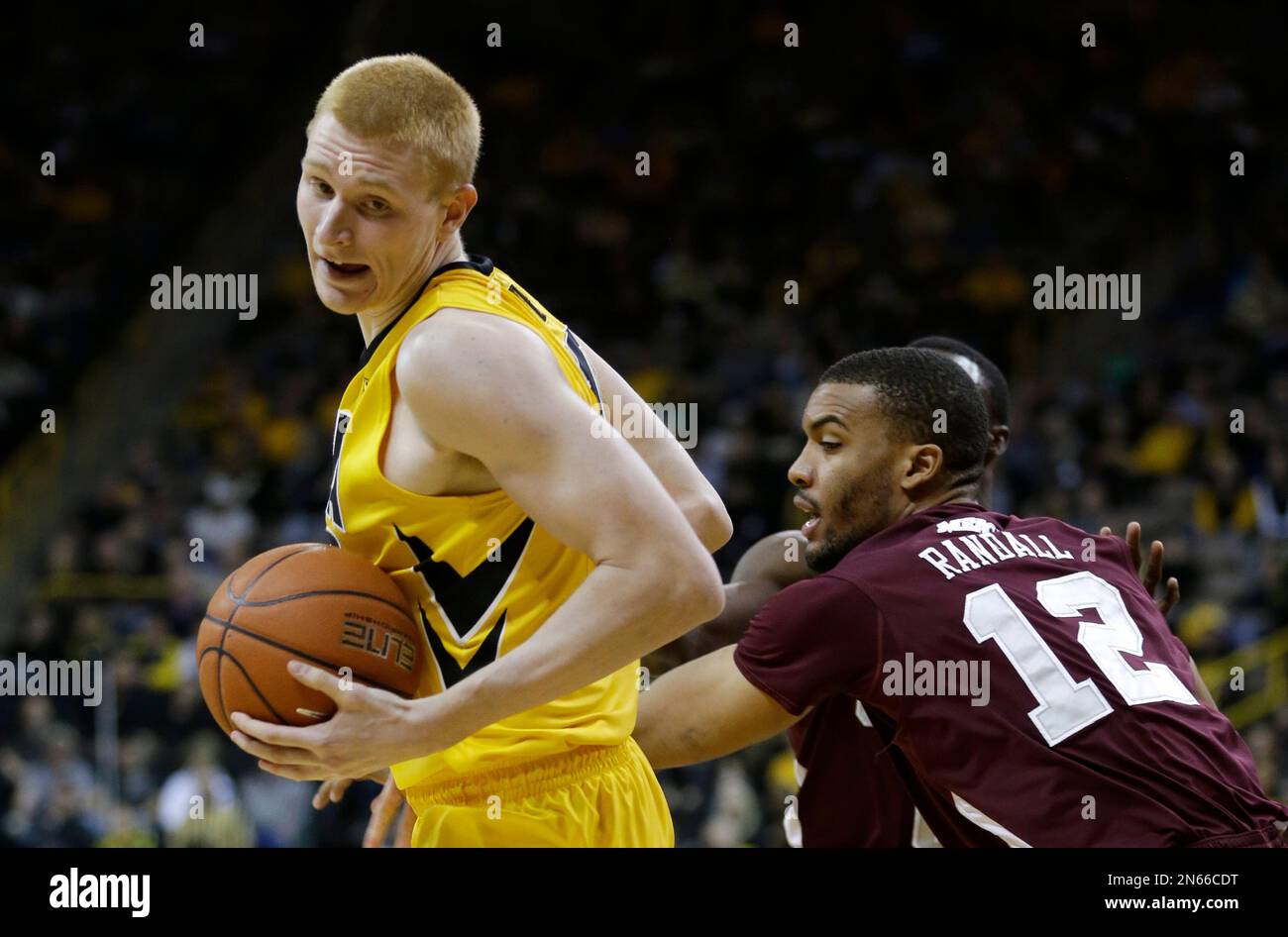Iowa forward Aaron White drives around Maryland-Eastern Shore forward ...