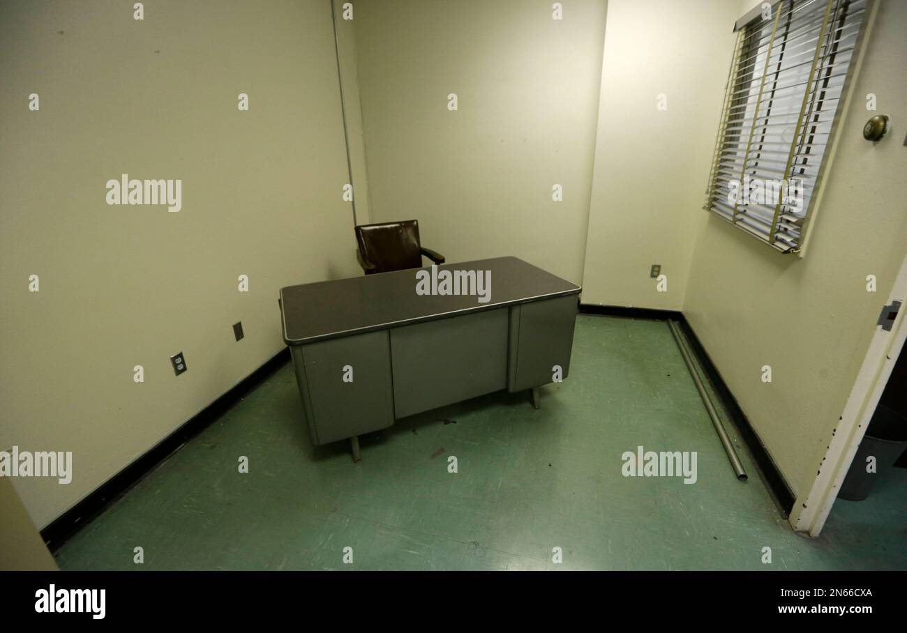 A desk and chair sit in the Dallas Police interrogation room where Lee ...