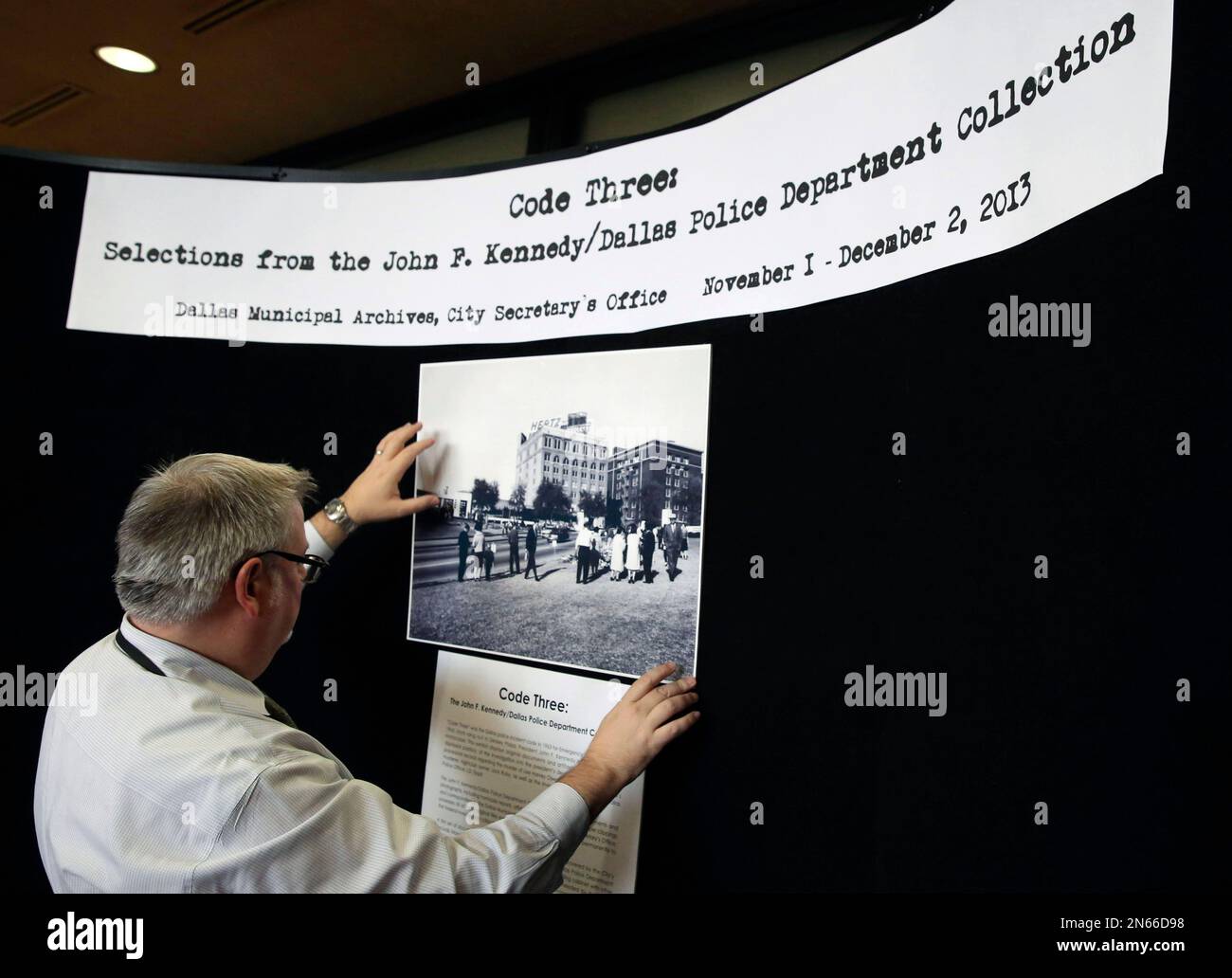 In this Nov. 6, 2013 photo, Dallas City Archivist John Slate prepares ...