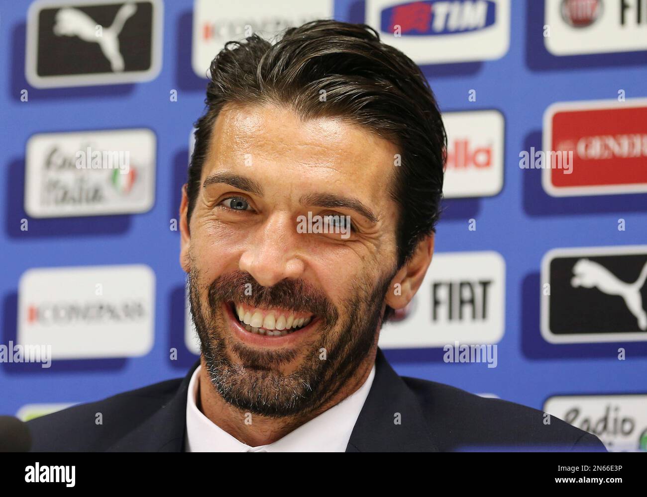 Italy goalkeeper Gianluigi Buffon smiles as he arrives for a press ...