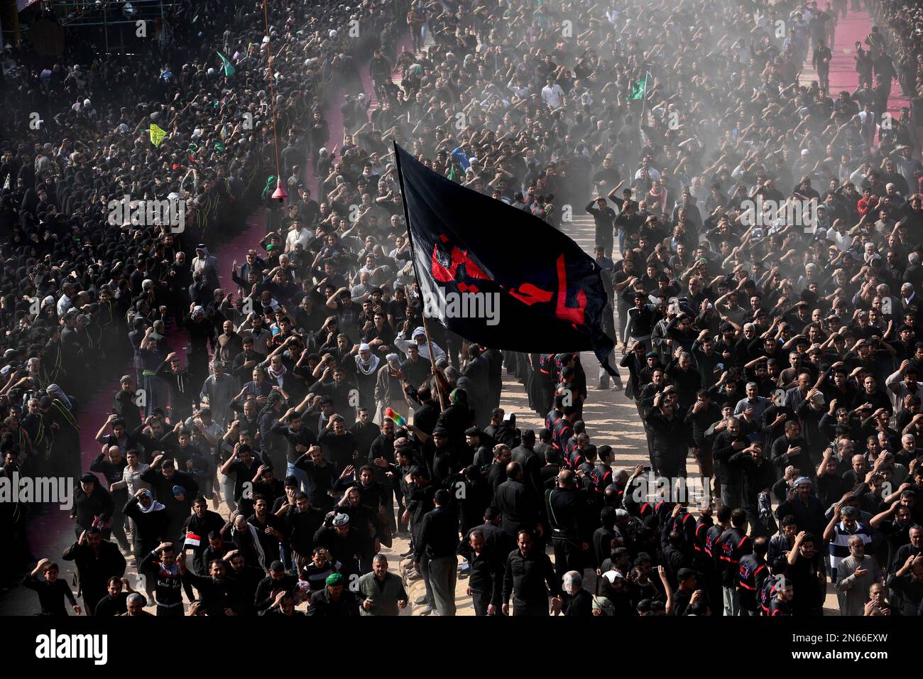 Shiite worshippers gather between the holy shrines of Imam Abbas and ...