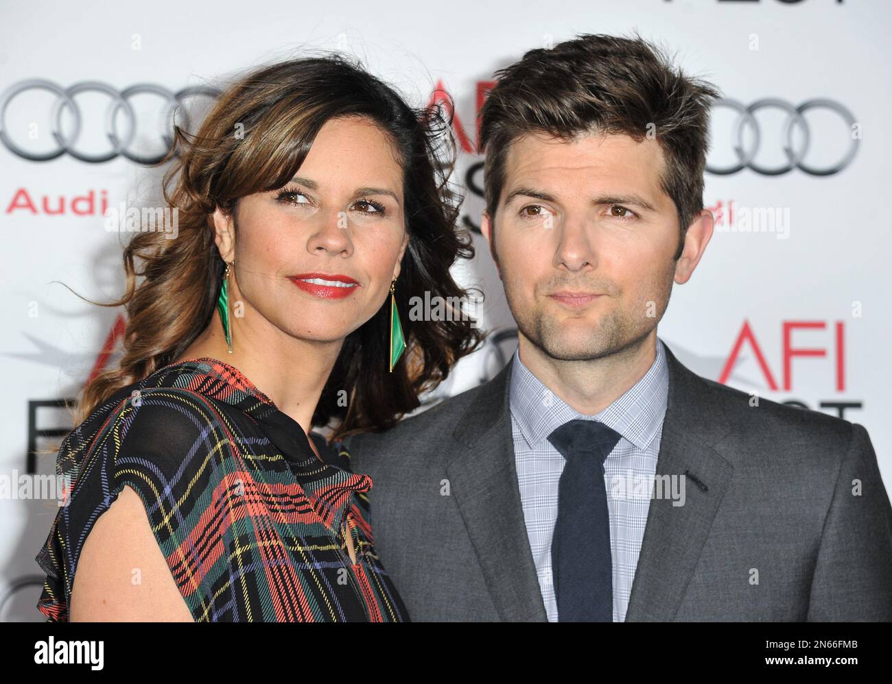 Adam Scott, left, and Naomi Scott arrive at the 2013 AFI Fest premiere ...