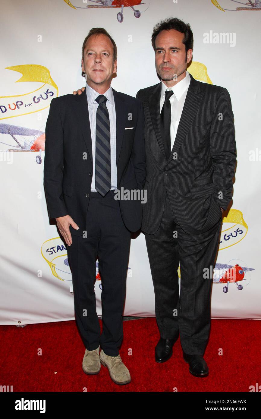 Kiefer Sutherland (L) and Jason Patric arrive at the "Stand Up For Gus ...
