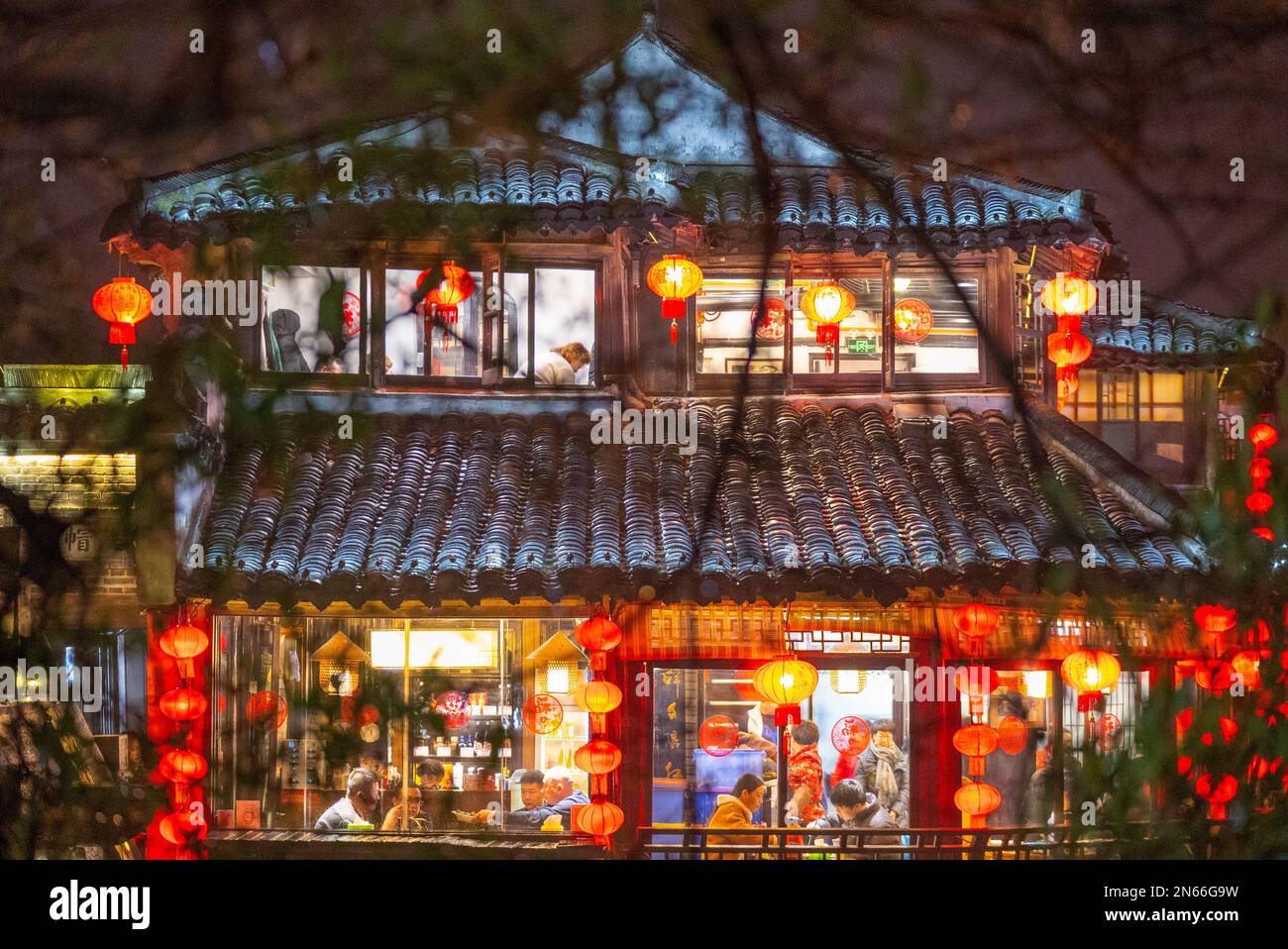 JIAXING, CHINA - FEBRUARY 9, 2023 - Tourists have dinner at Xitang ...