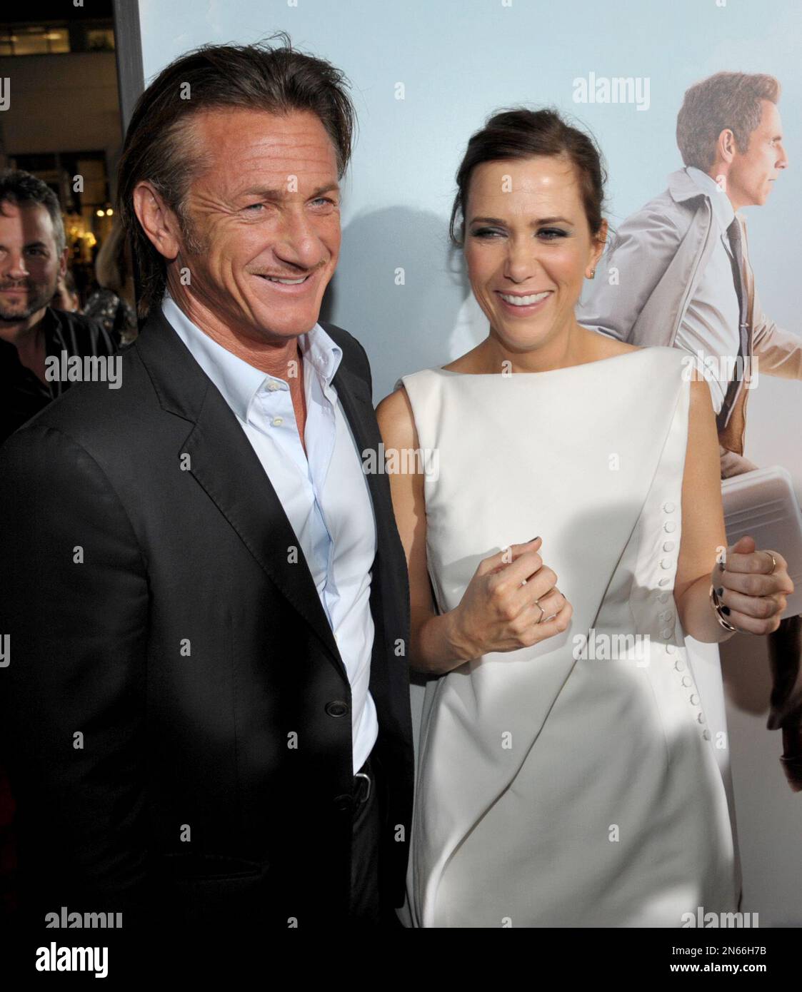 Sean Penn, left, and Kristen Wiig arrive at the AFI Fest premiere of ...