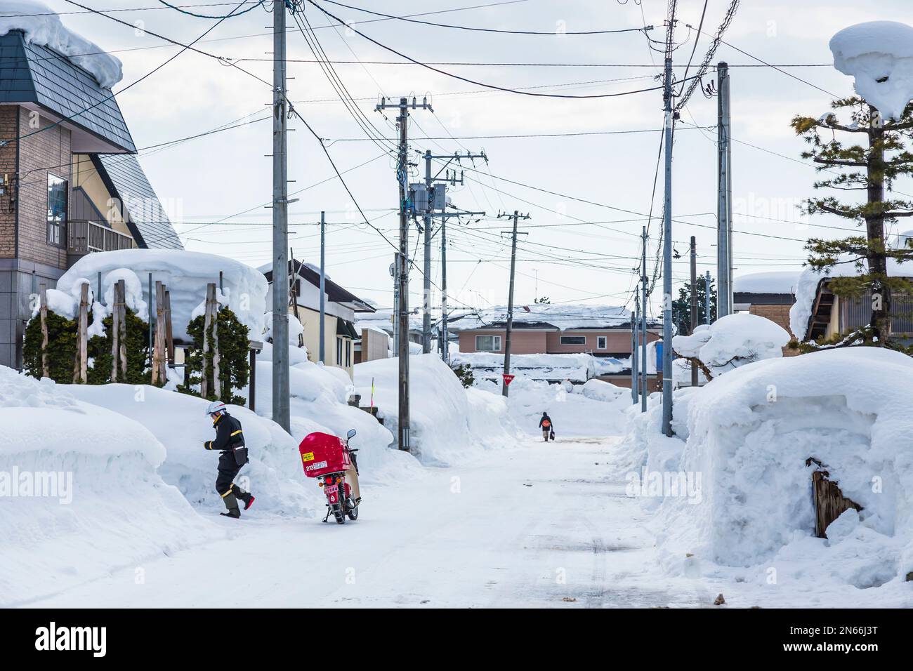Postman with motorcycle, Life in a snow country, famous city by heavy ...