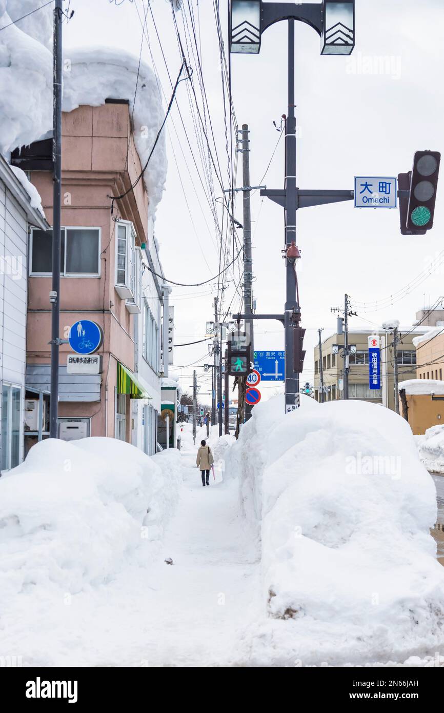 Sidewalk separated by snow wall, Life in a snow country, famous city by ...
