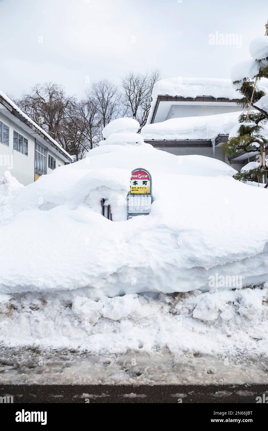 Bus stop in massive snow, Life in a snow country, famous city by heavy ...