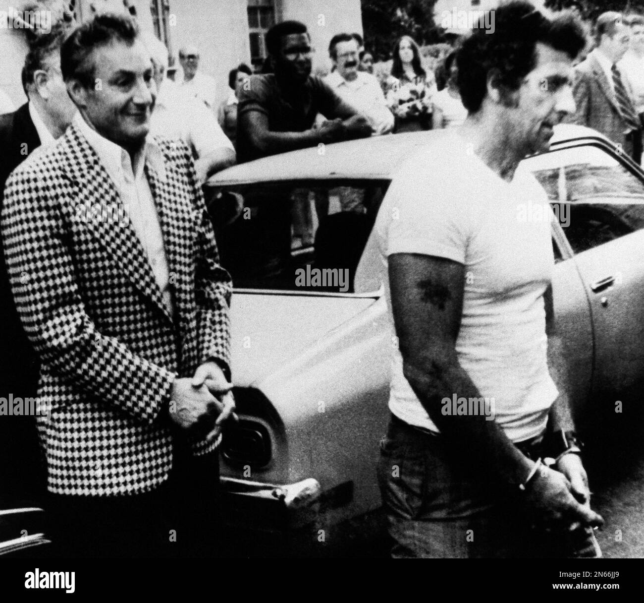 Salvatore Briguglio, left, and George J. Vangelakos leave U.S. Federal ...