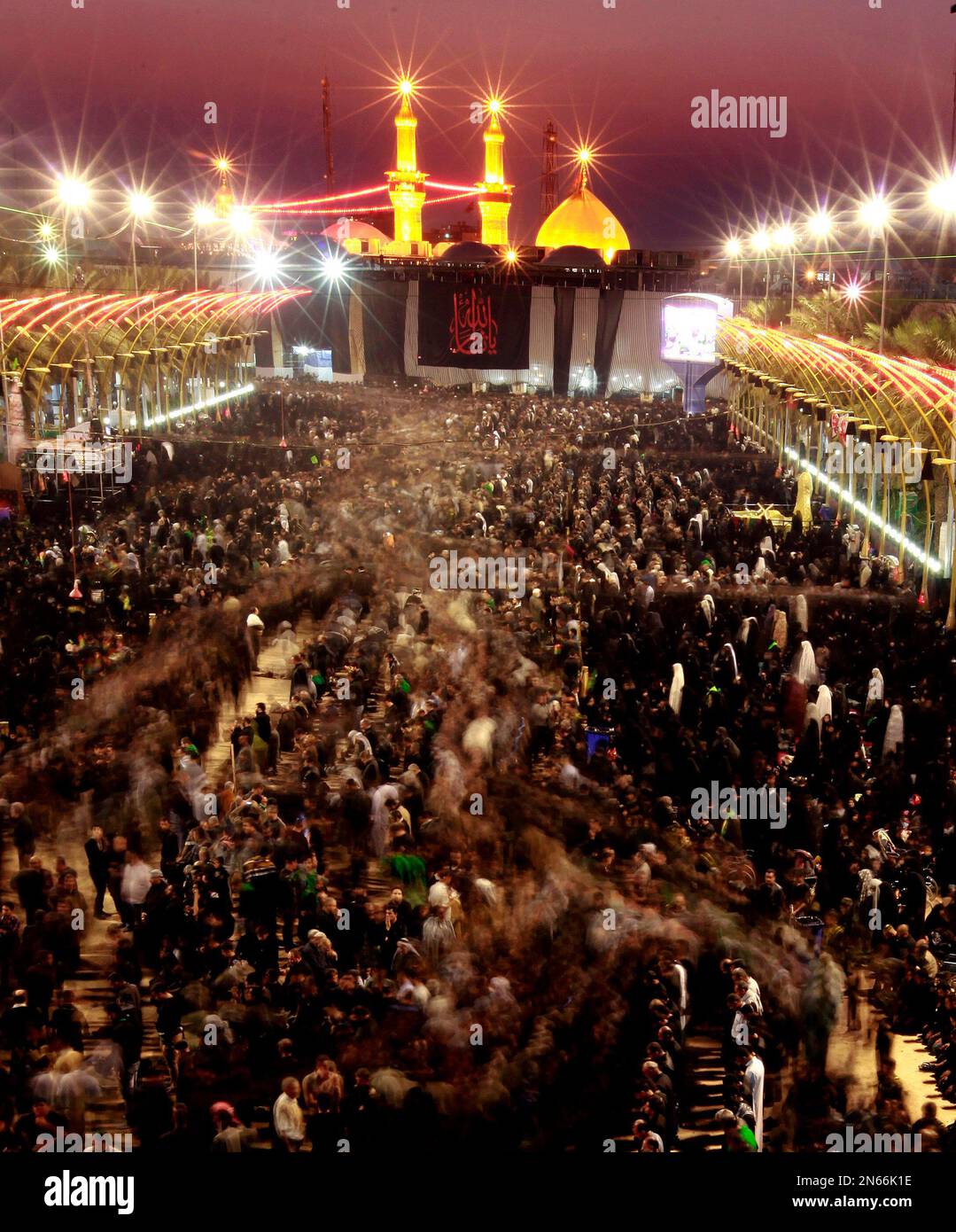 Shiite faithful worshippers gather between the holy shrines of Imam ...