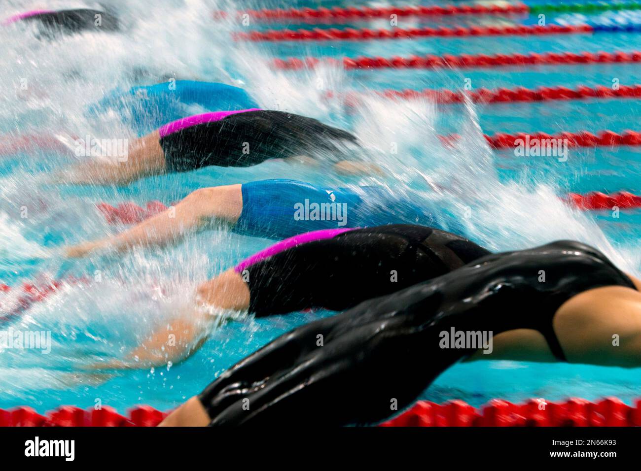 Swimmers jump to compete in the Women's 200-meter backstroke final at ...