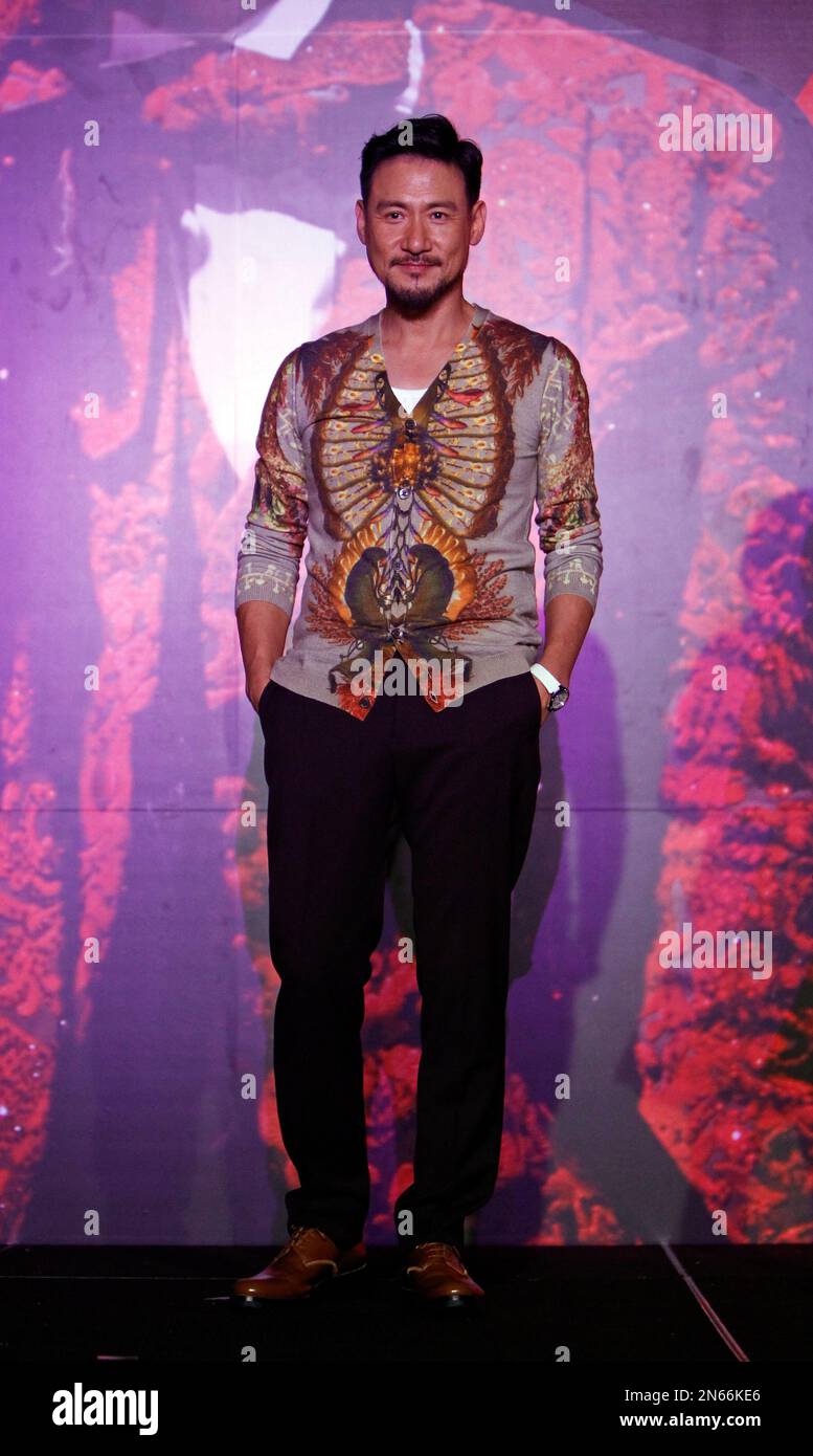 Hong Kong singer Jacky Cheung poses for photographers during a press ...