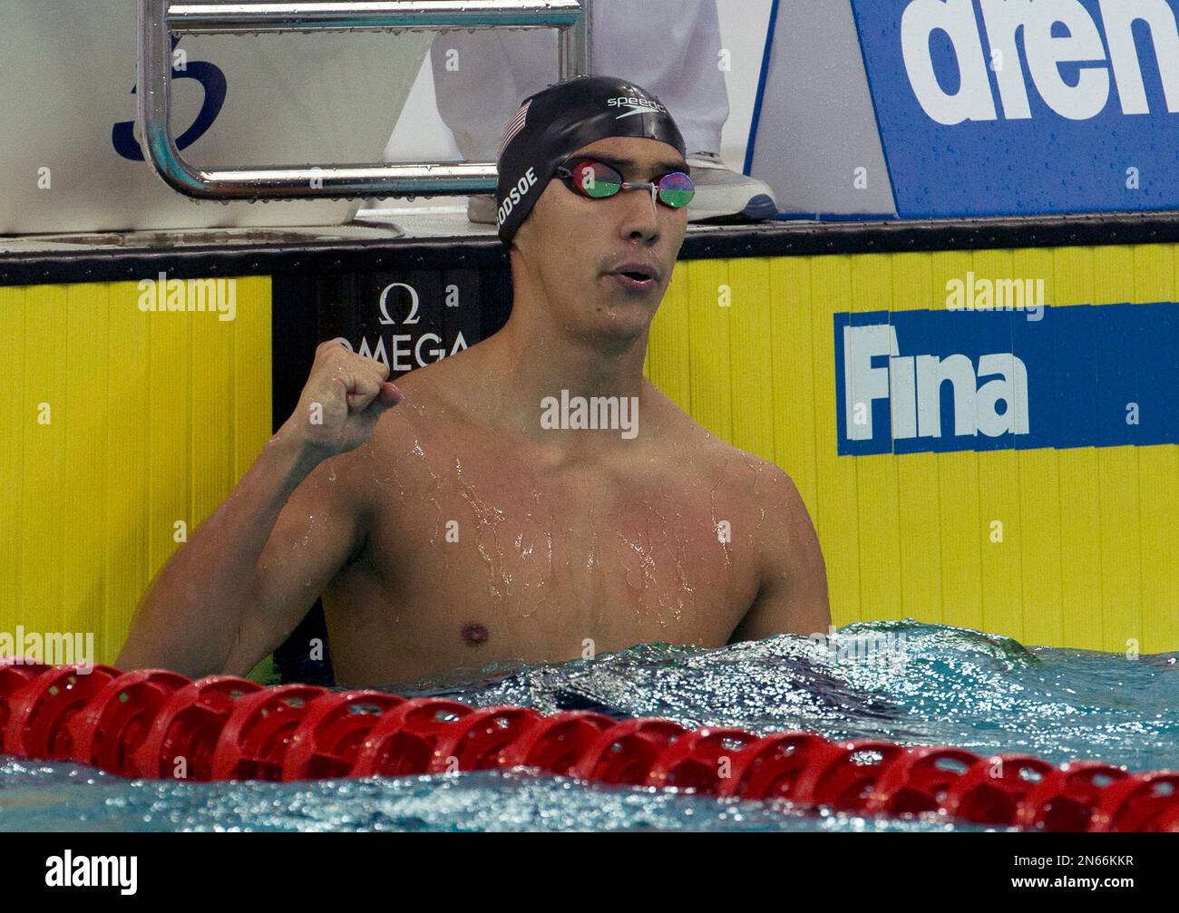 Eugene Godsoe of U.S. reacts after winning the Men's 100-meter ...