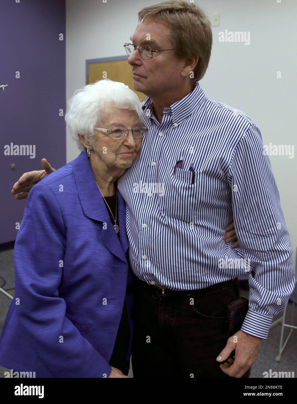 Marie Tippit, left, widow of JD Tippit, hugs her son Curtis Tippit ...