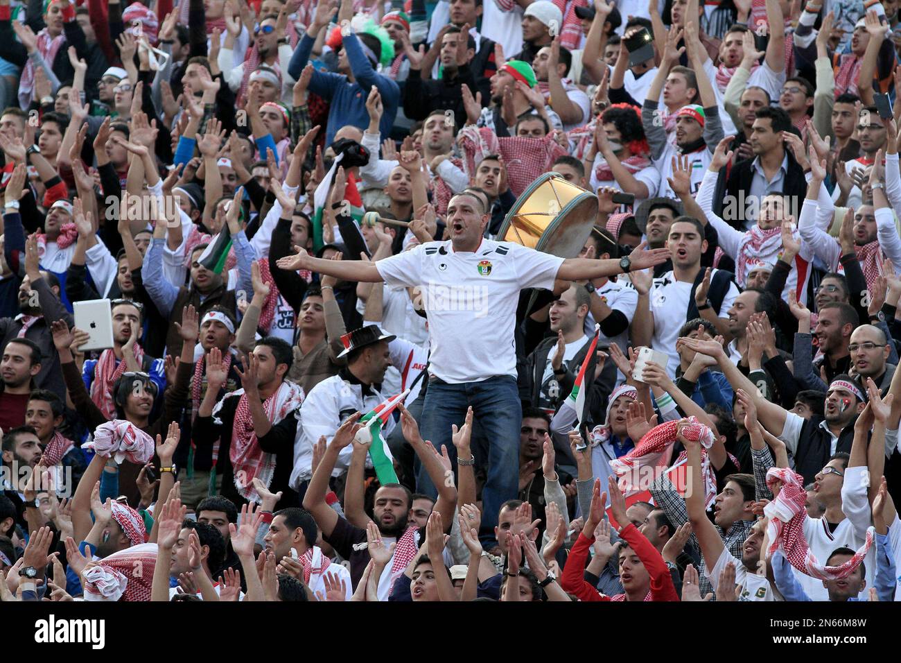 Jordanian fans cheer for their team during the World Cup play off first ...