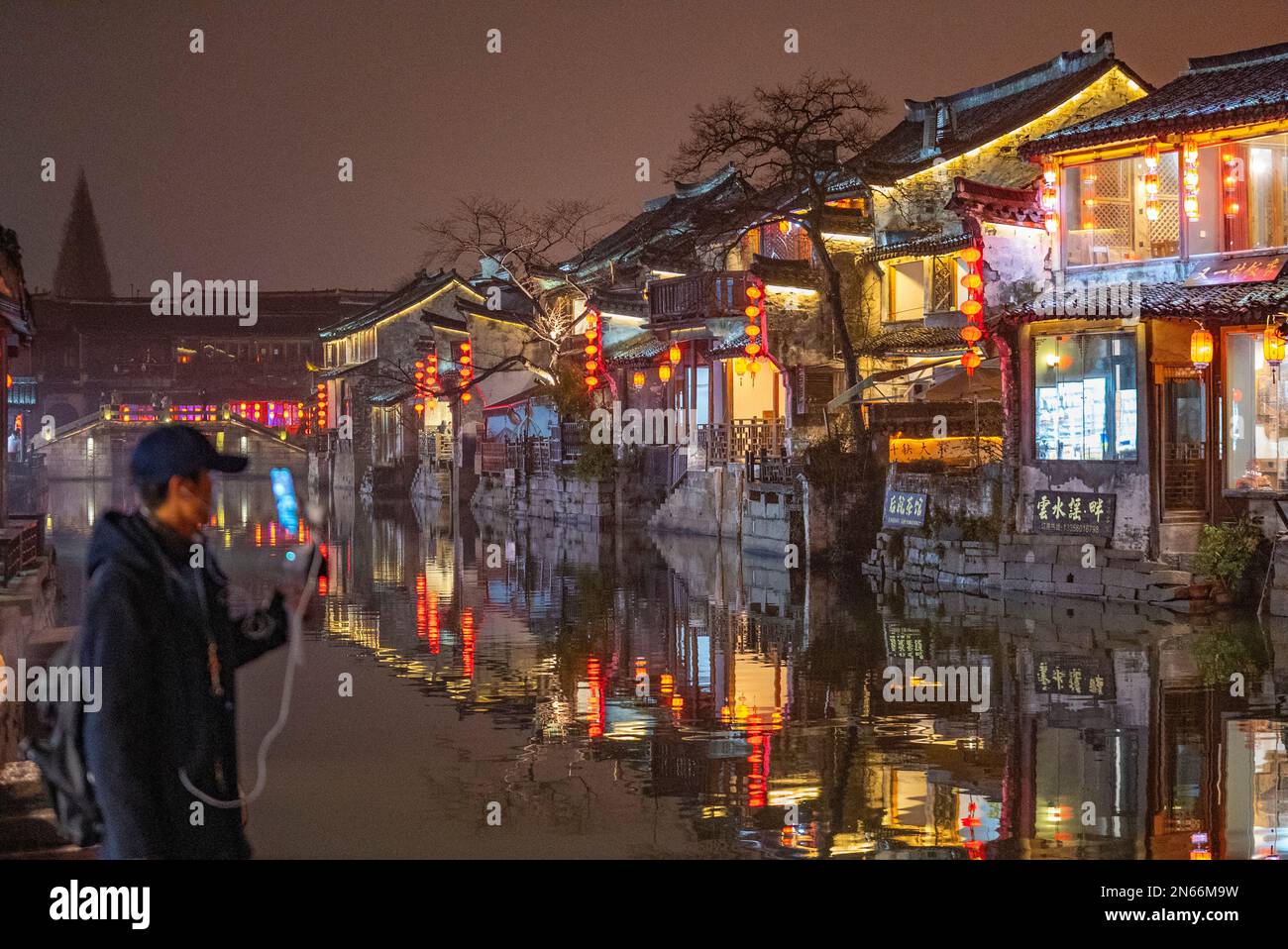 JIAXING, CHINA - FEBRUARY 9, 2023 - Tourists visit Xitang Ancient Town in Jiaxing, East China's ...