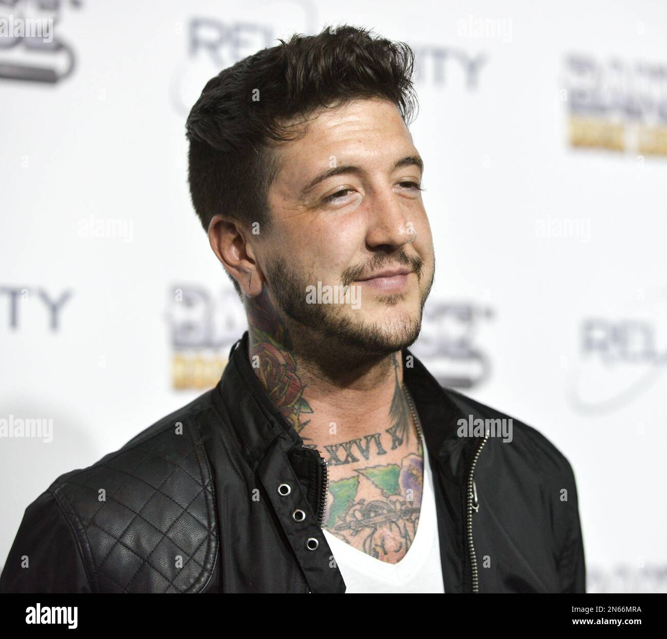 Austin Carlile arrives at the "Bandfuse: Rock Legends" video game ...
