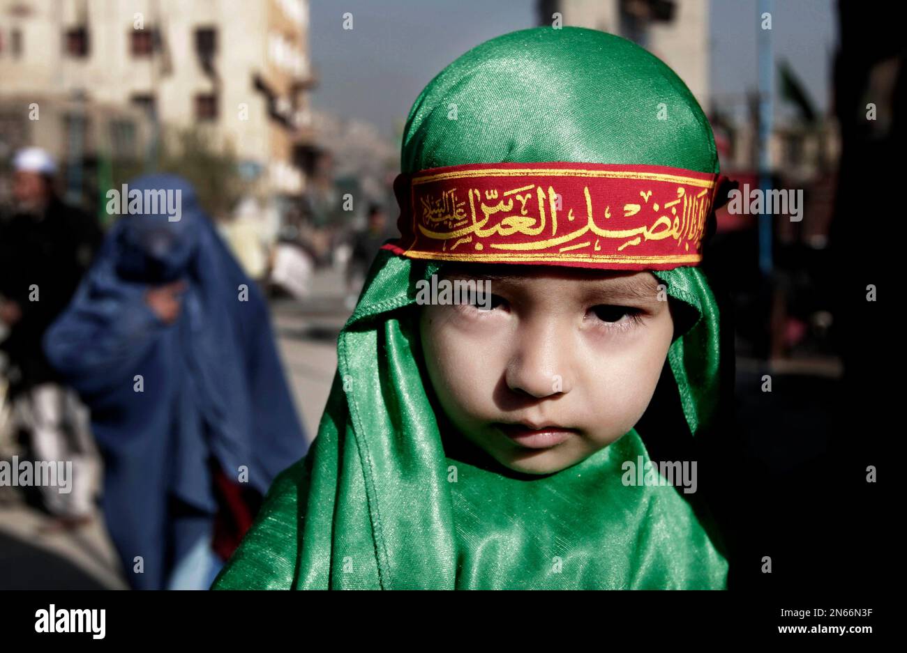 Sayed Mustafa, 2, poses for photograph, near a mosque, a day ahead of ...