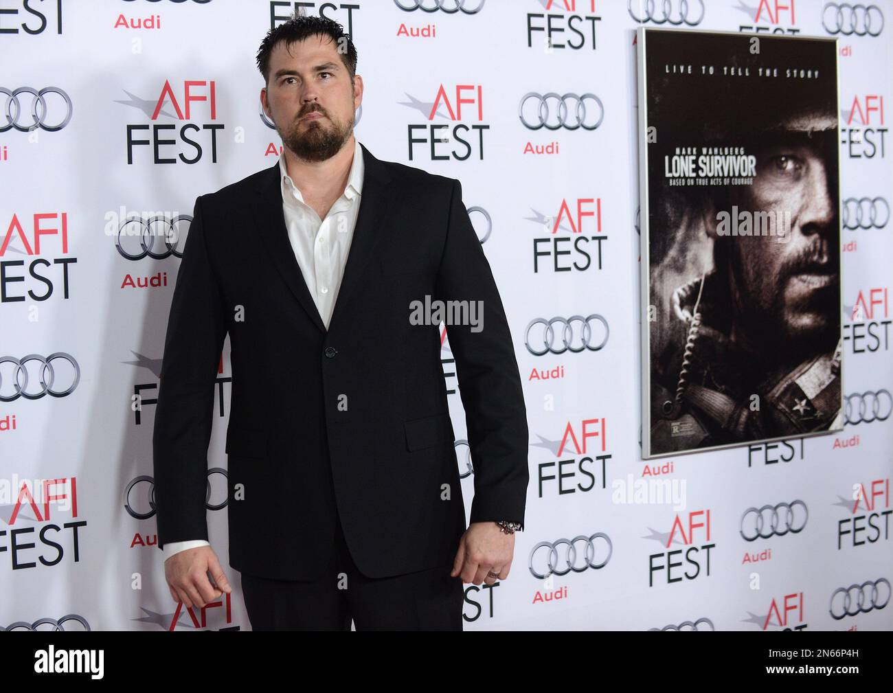 Retired petty officer 1st class Marcus Luttrell arrives at the 2013 AFI ...