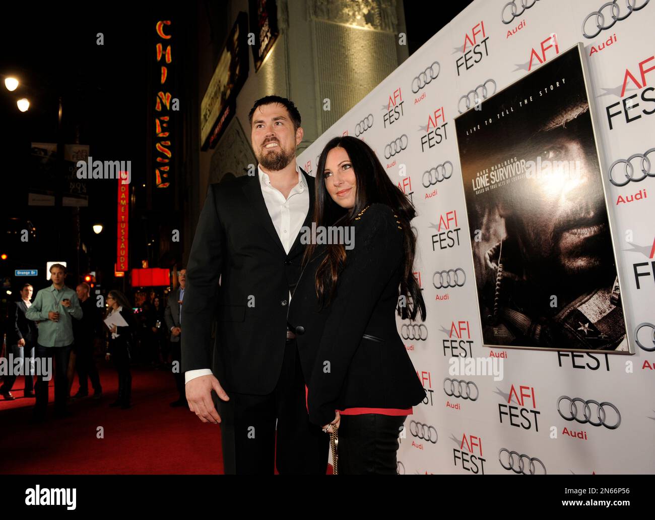 Retired petty officer 1st class Marcus Luttrell, left, and Melanie ...
