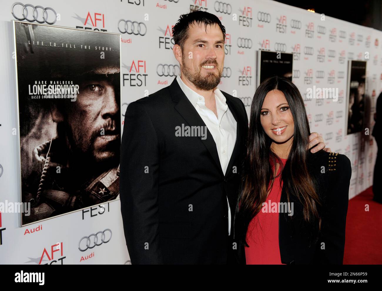 Retired petty officer 1st class Marcus Luttrell, left, and Melanie ...