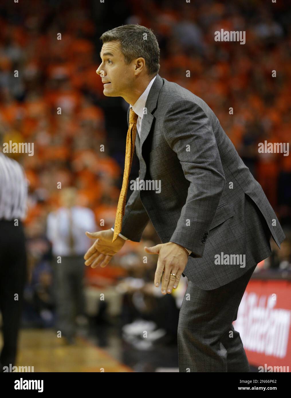 Virginia head coach Tony Bennett directs his team during the first half ...