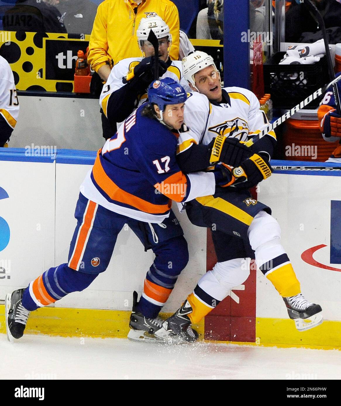 New York Islanders' Matt Martin (17) slams into Nashville Predators ...