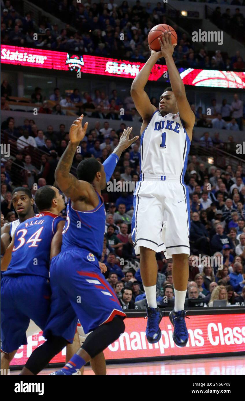 Duke forward Jabari Parker (1) shoots over Kansas forward Perry Ellis ...