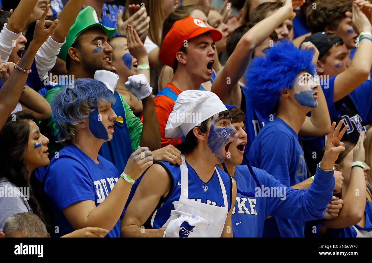 Duke fans cheer their team on during the second half of an NCAA college ...