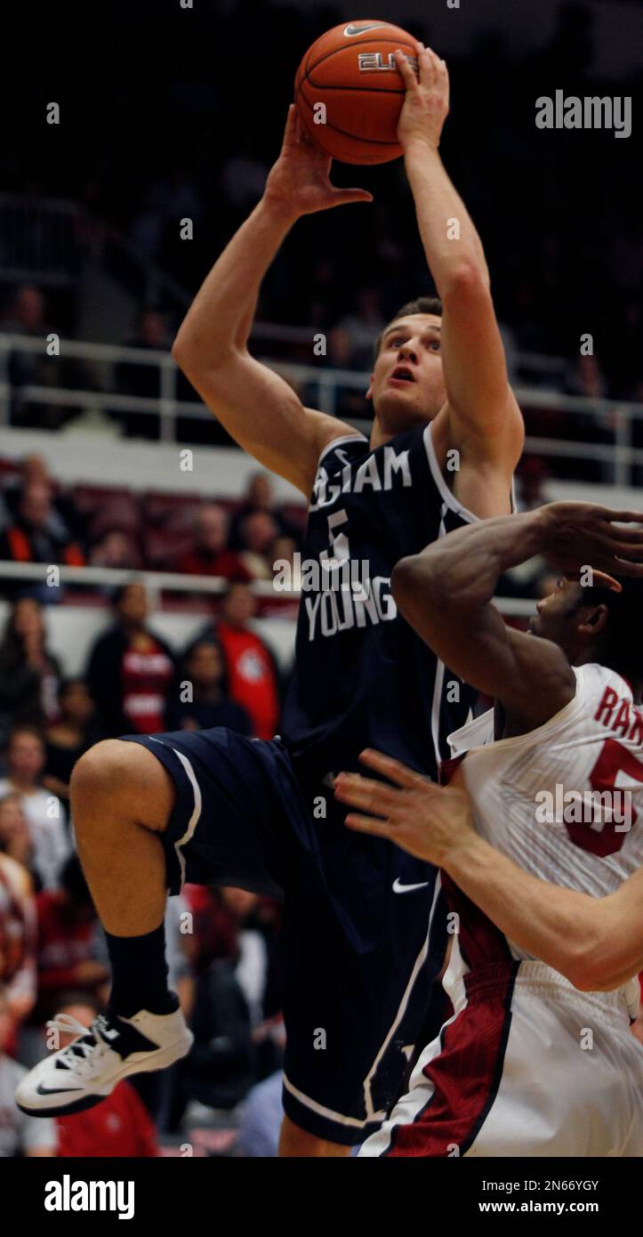 Brigham Young's Kyle Collinsworth shoots over Stanford's Chasson Randle ...