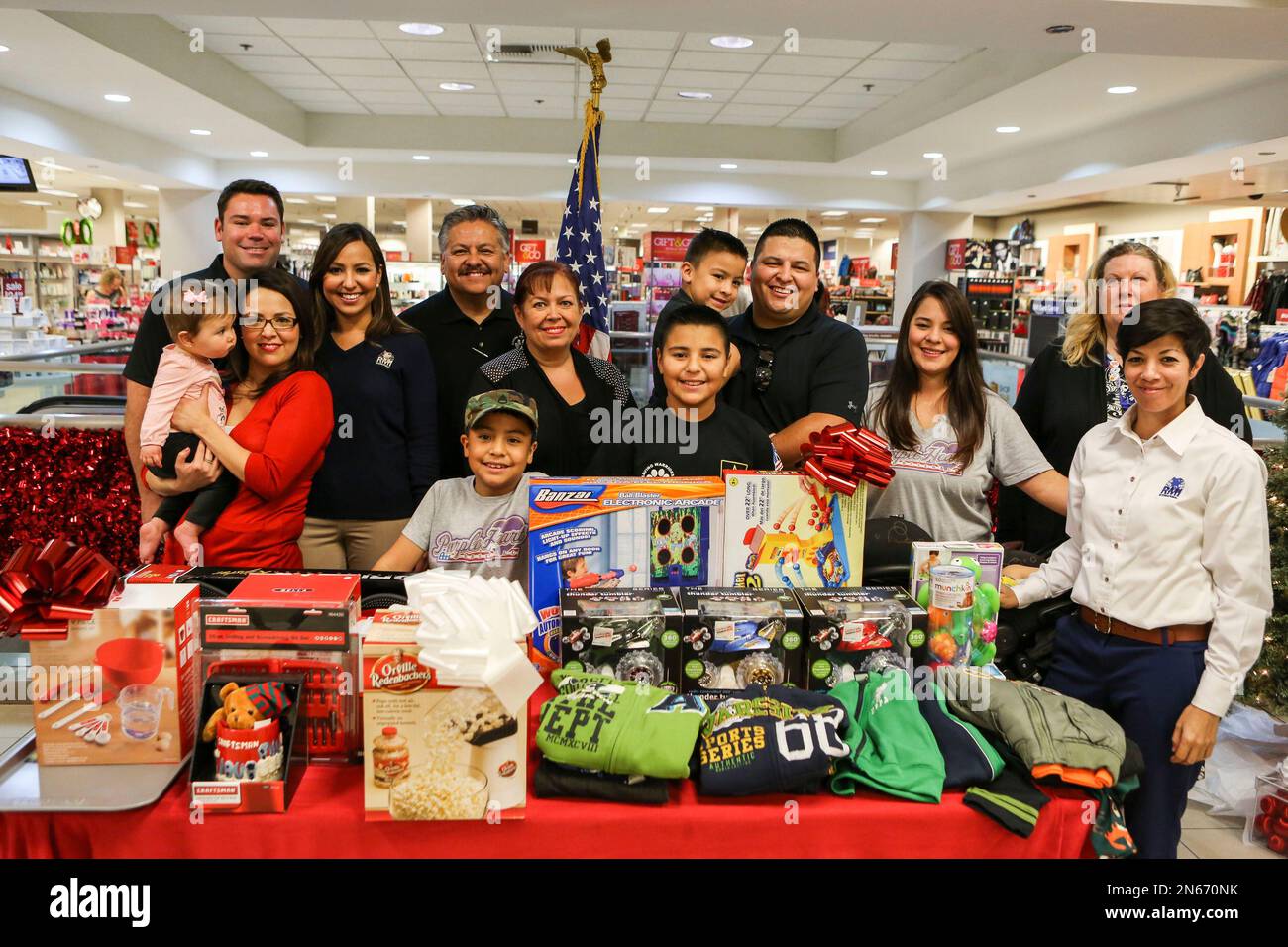 Army veteran Richard Rodriguez Jr. and his family pose during a ...