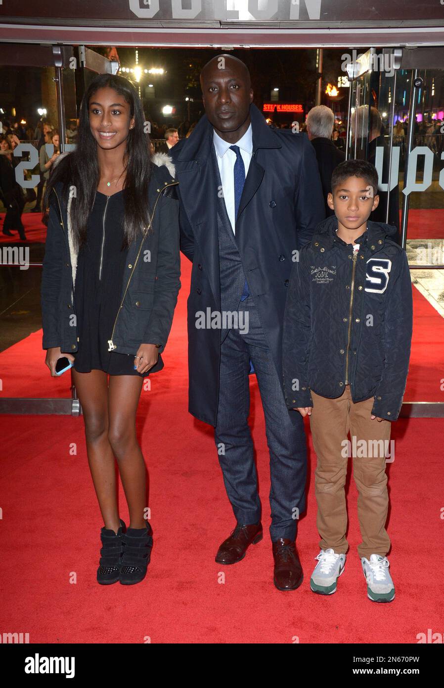 Vashion designer Ozwald Boateng (middle) with his children Emilia (left ...
