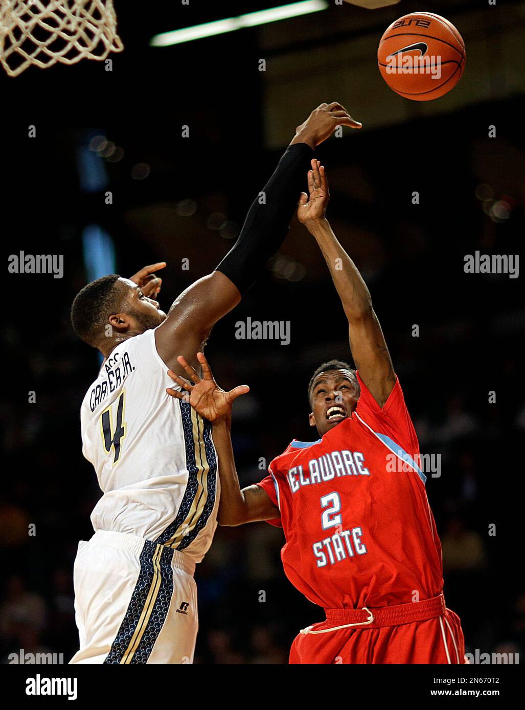 Georgia Tech's Robert Carter, Jr., left, blocks the shot of Delaware ...