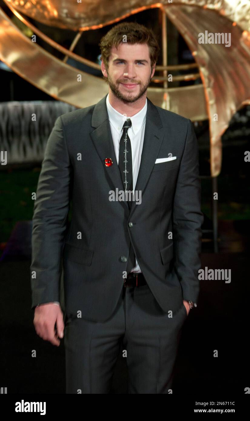 Australian actor Liam Hemsworth arrives on the red carpet for the World ...