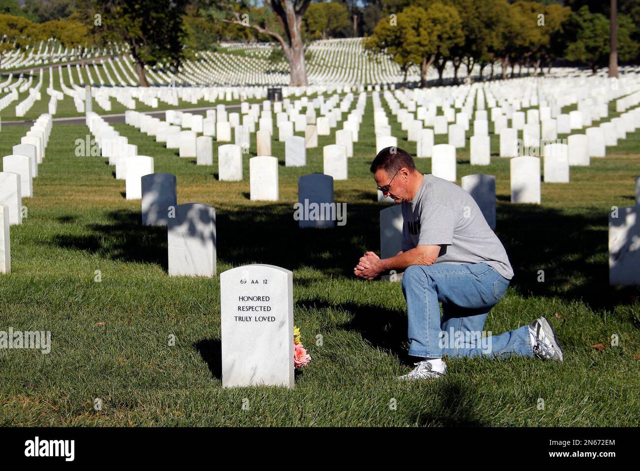 Vietnam War veteran, Greg Reilly visits the grave of his friend, U.S ...