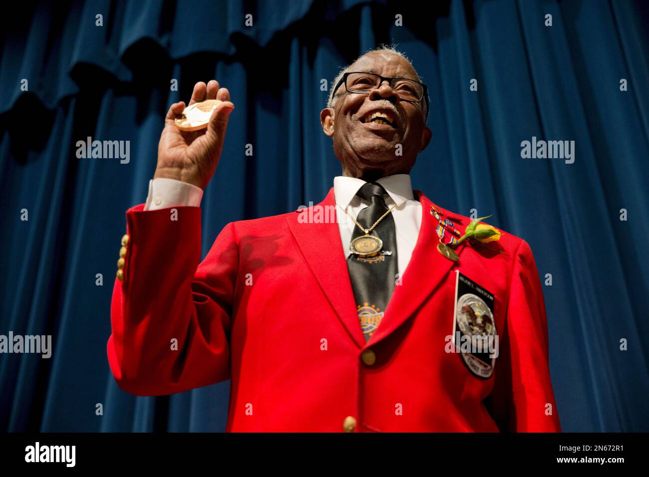 Maj, L. Anderson, 88, of Washington, an original Tuskegee Airman, holds ...
