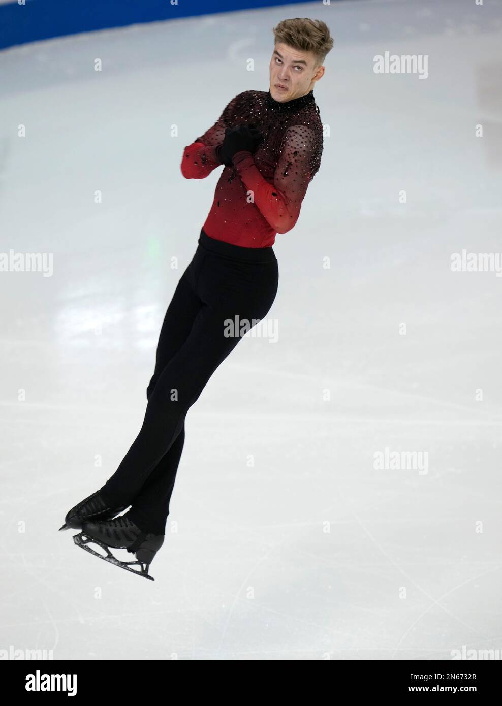 Conrad Orzel, of Canada, performs in the men's short program at the ...