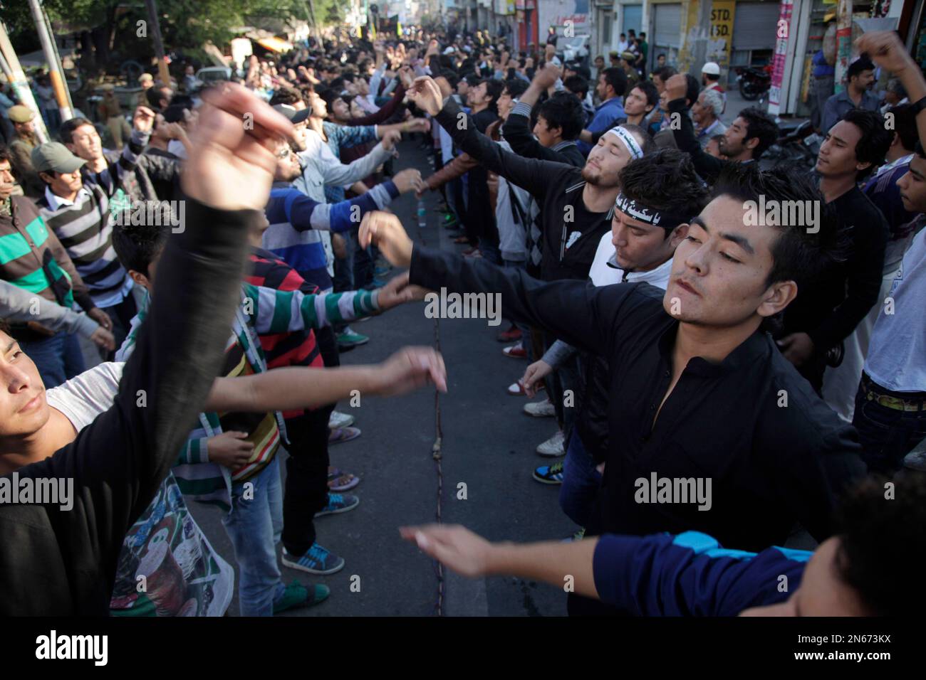 Indian Shite Muslims beat their chests at a procession during the holy ...
