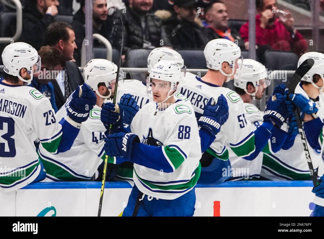 Vancouver Canucks' Nils Aman (88) celebrates with teammates after ...