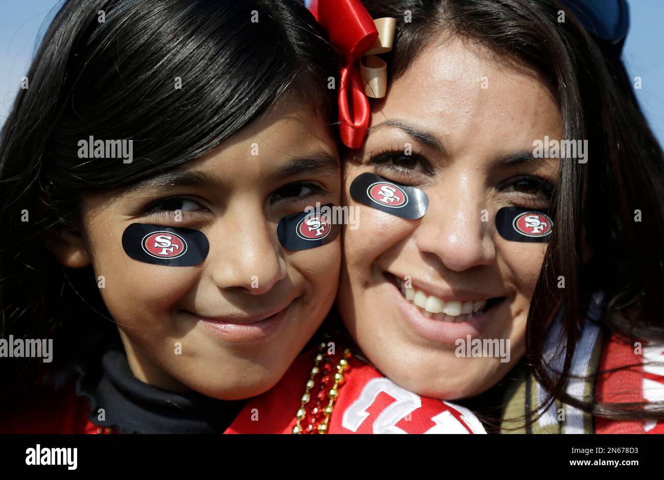Yisel Arias, 10, left, and Erika Arias pose for photographs in the ...