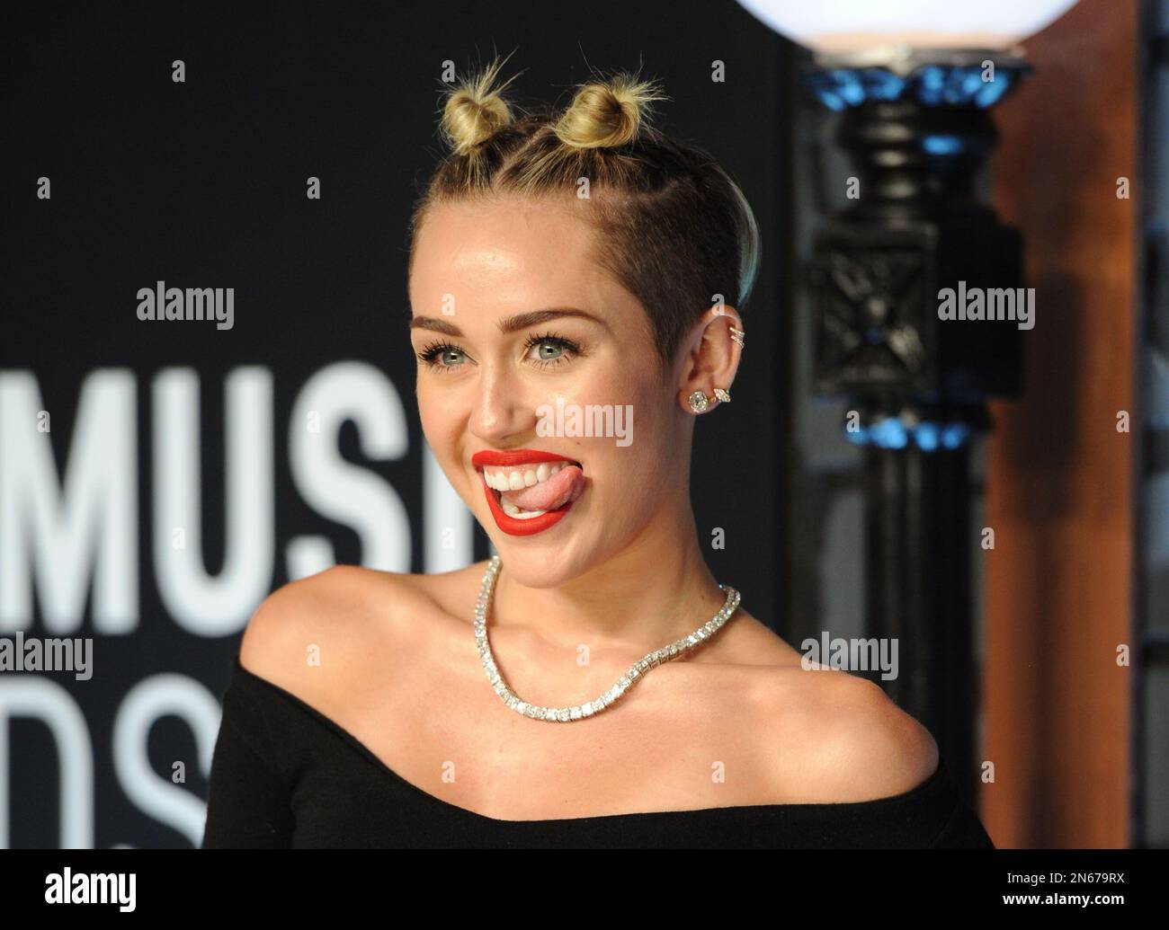 FILE - This Aug. 25, 2013 file photo shows singer Miley Cyrus at the ...