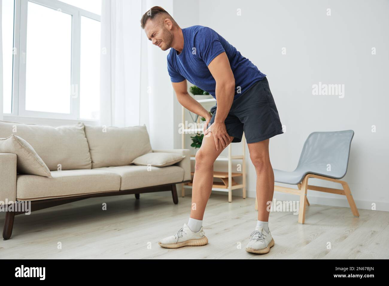 Man leg pain from exercising at home, workout injury, muscle and ...