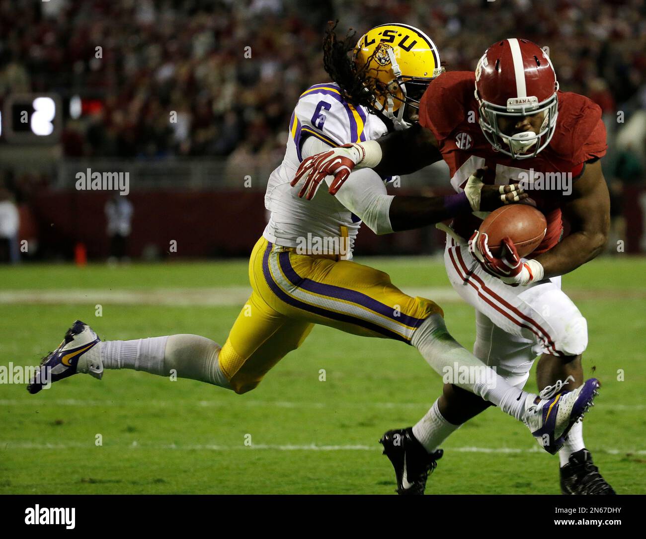 Alabama running back Jalston Fowler (45) runs against LSU safety Craig ...